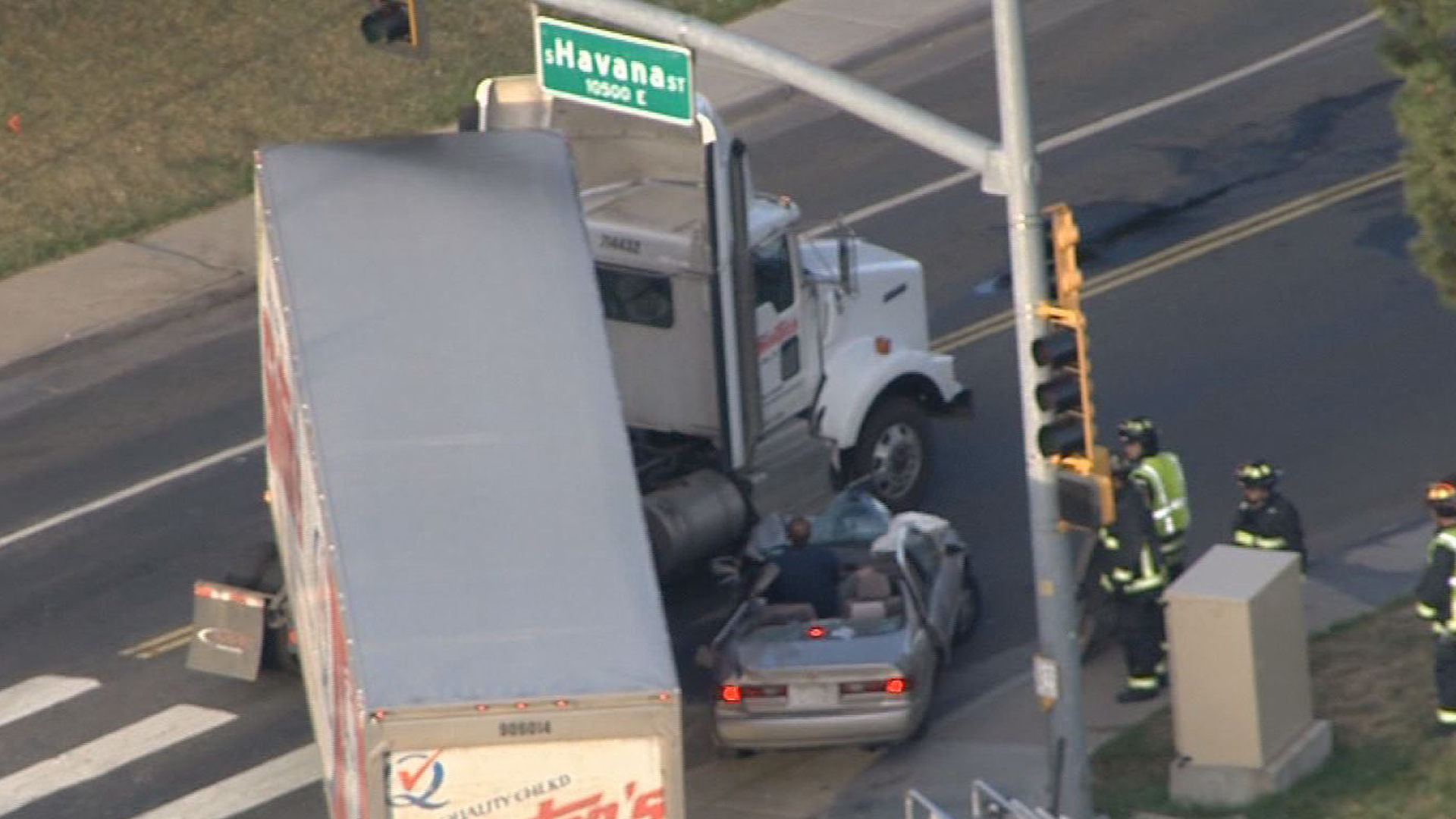 Car stuck under semi-truck cause traffic congestion | 9news.com