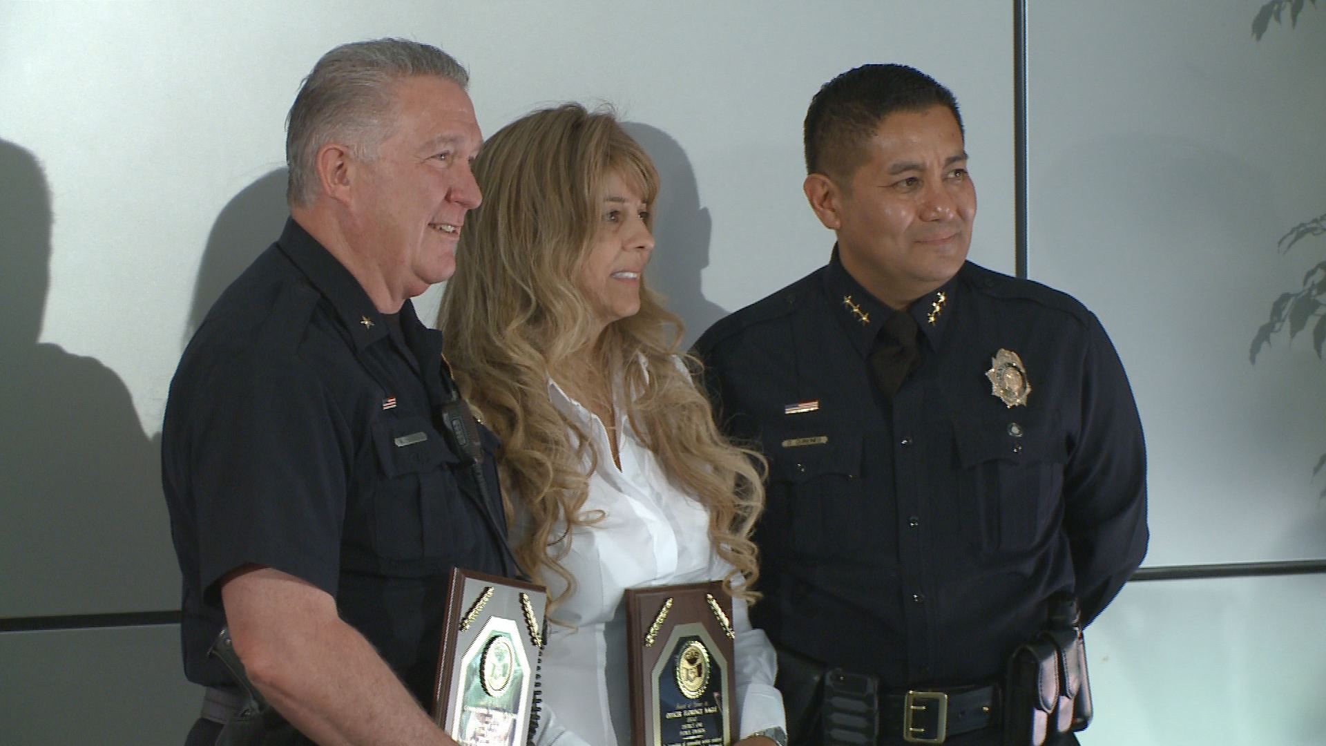 Denver Police couple awarded for helping elderly man | 9news.com