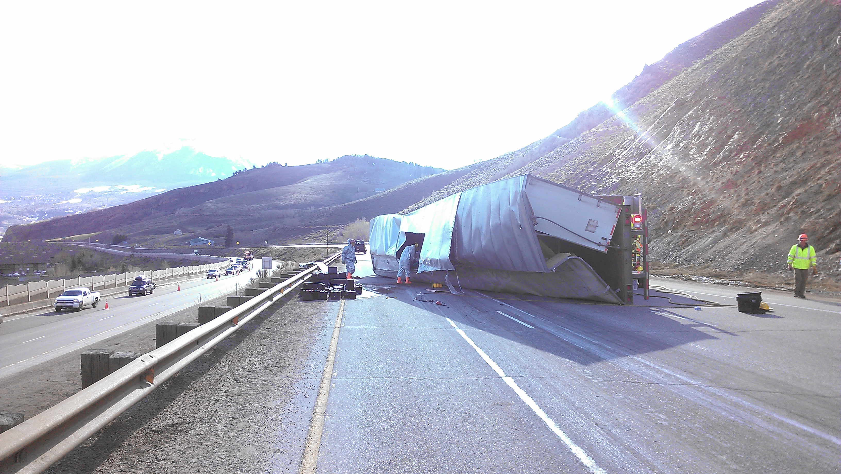 Battery acid spill after big-rig crash on I-70 | 9news.com