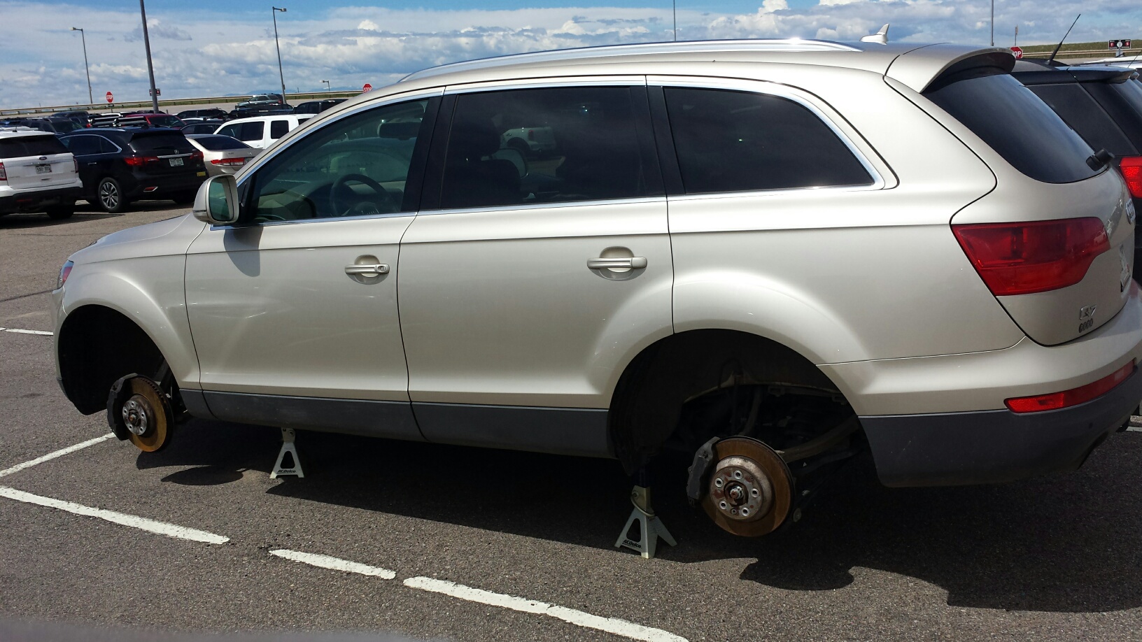 Man returns to DIA to find all 4 tires stolen | 9news.com