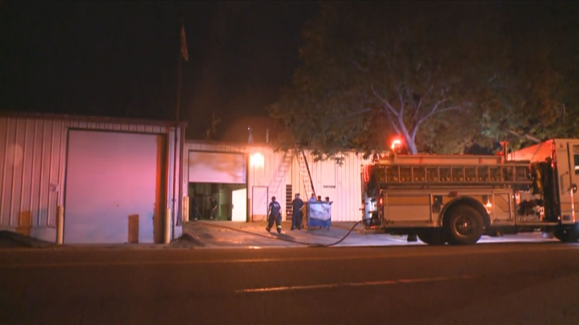 Firefighter falls through roof on scene of Dumpster fire | 9news.com