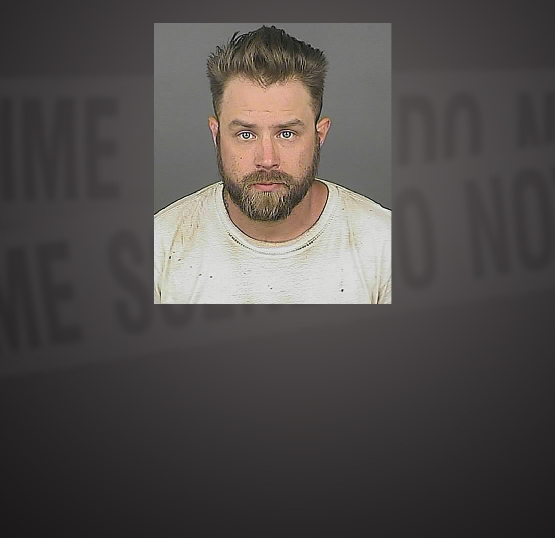 Man charged with racially-motivated assault on woman | 9news.com