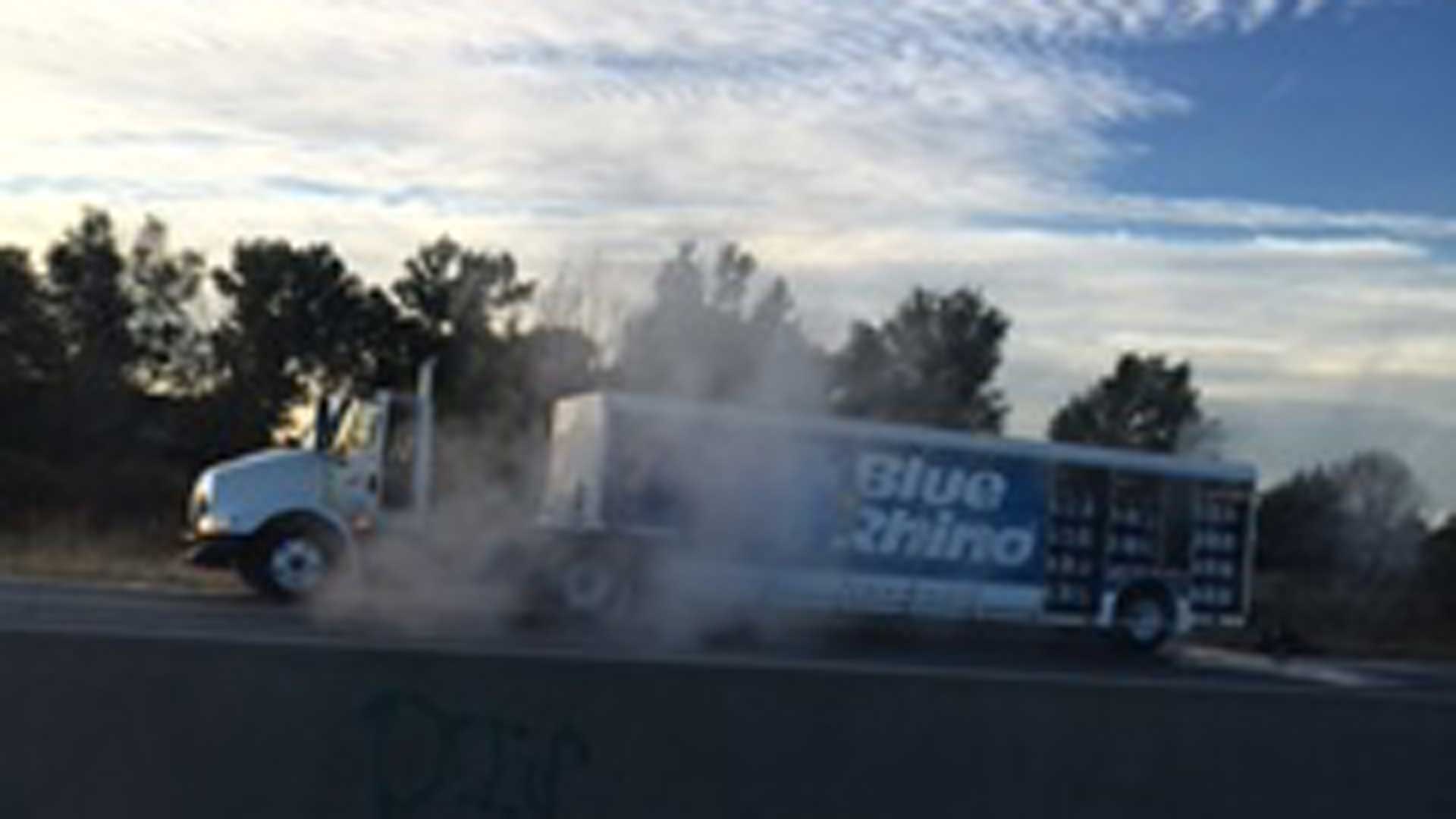 Truck carrying propane tanks catches on fire | 9news.com
