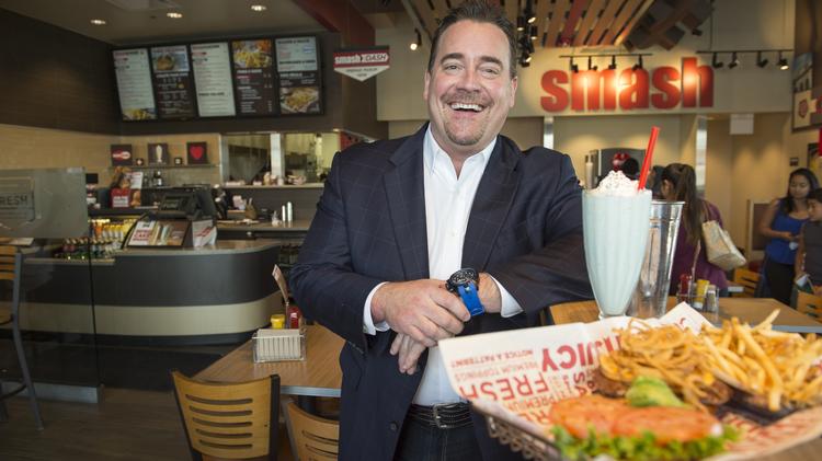 Philippines company buys 40 percent of Smashburger | 9news.com