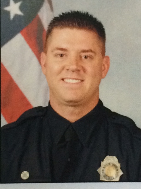 Injured DPD officer in 'good spirits' | 9news.com