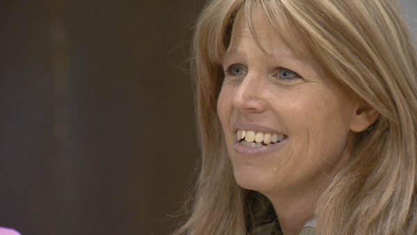 Teacher battling cancer honored at surprise assembly | 9news.com