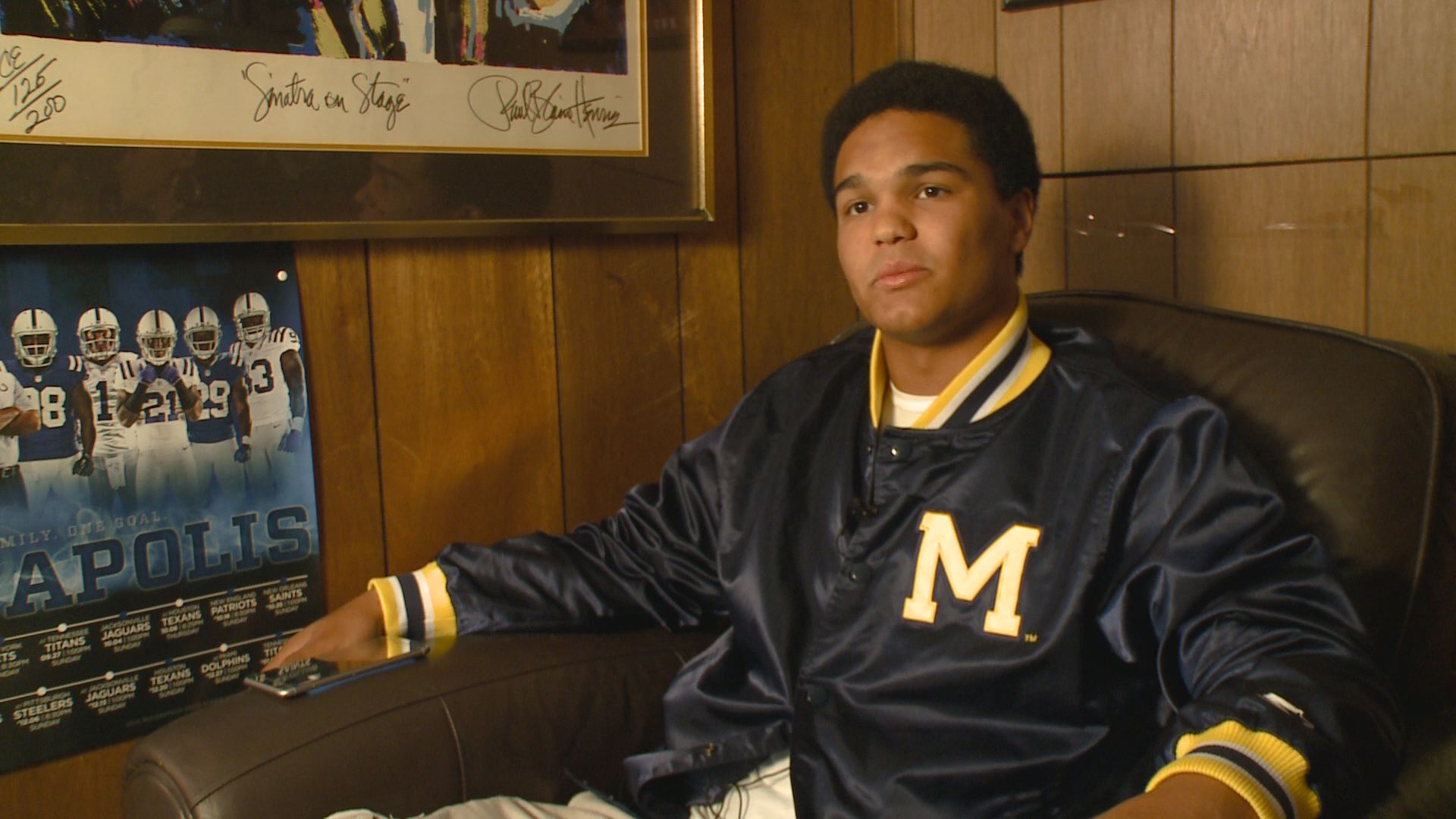 Fairview football's Carlo Kemp picks Michigan | 9news.com