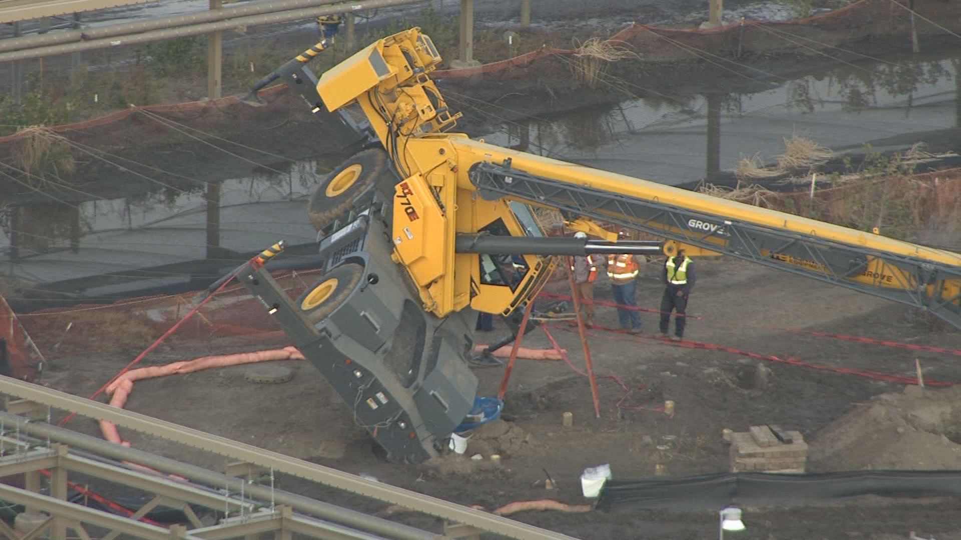 Crane tips over in Commerce City | 9news.com