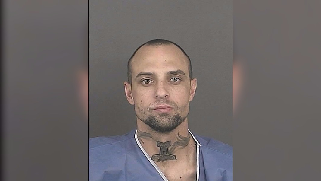 Man accused of shooting, critically injuring officer in court | 9news.com