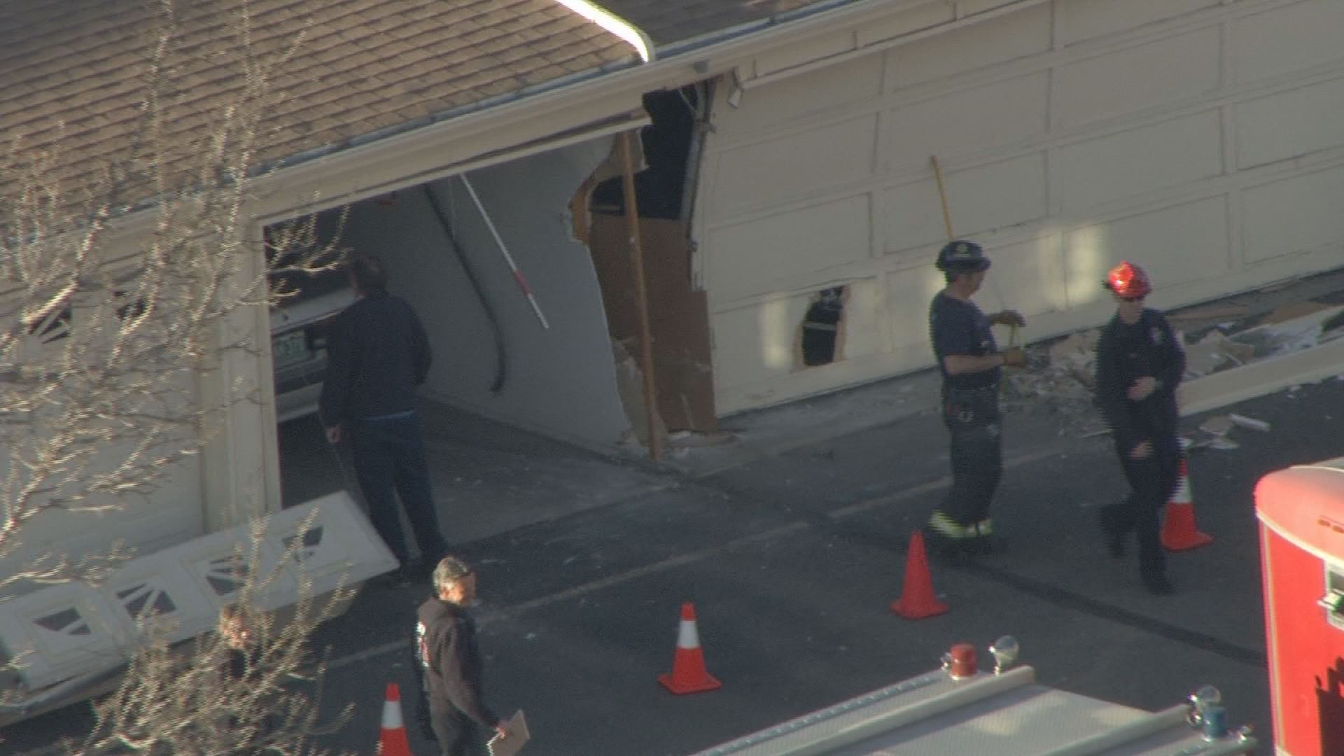SUV crashes into building, driver flees | 9news.com