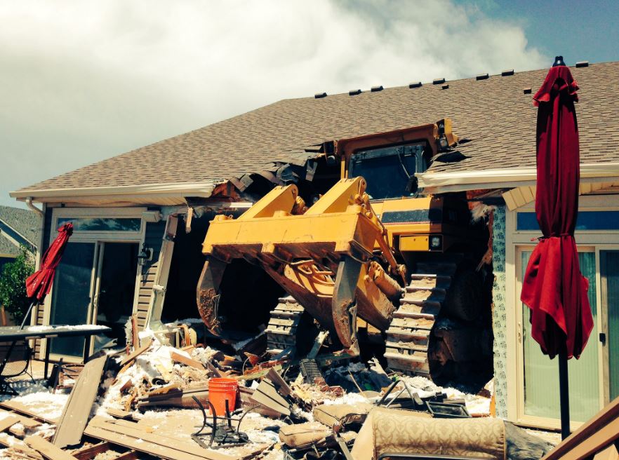 PHOTOS: Bulldozer crashes into Denver home | 9news.com