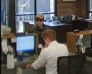 Photos released of Boulder bank robber | 9news.com