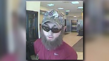 Fake beard bank robber sought | 9news.com