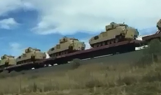 Scores of Army tanks line train in Englewood | 9news.com
