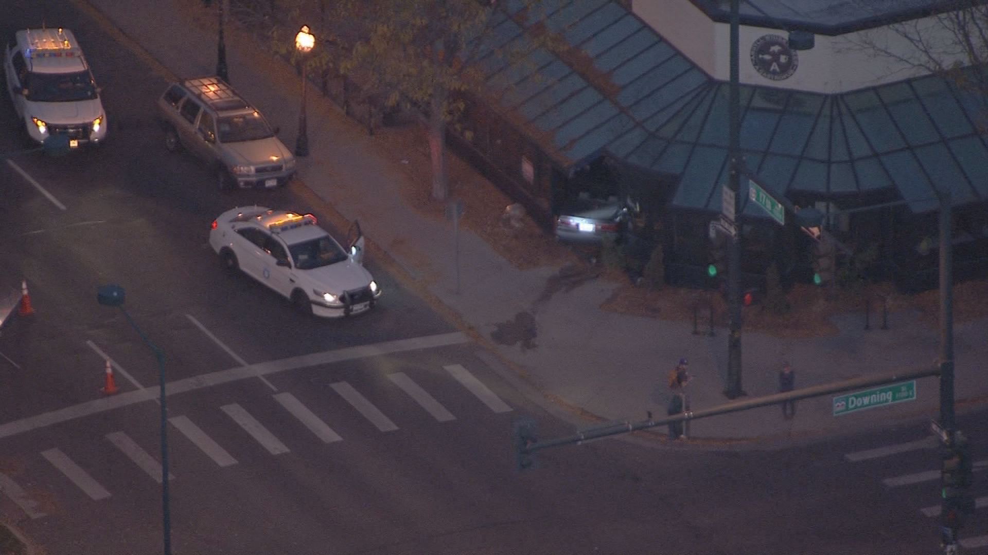 Car hits building at 17th and Downing | 9news.com