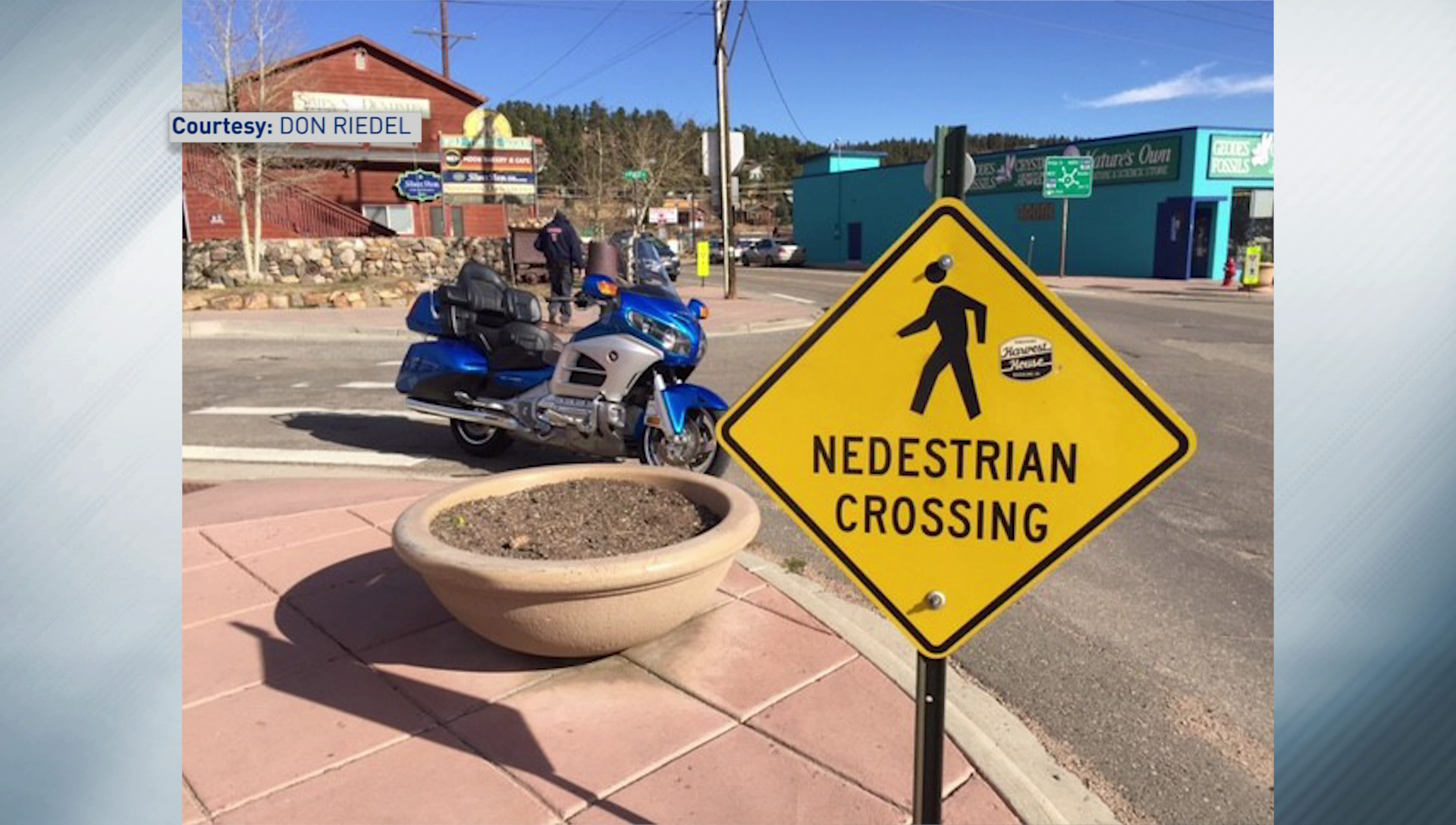 We don't endorse defacing crossing signs | 9news.com