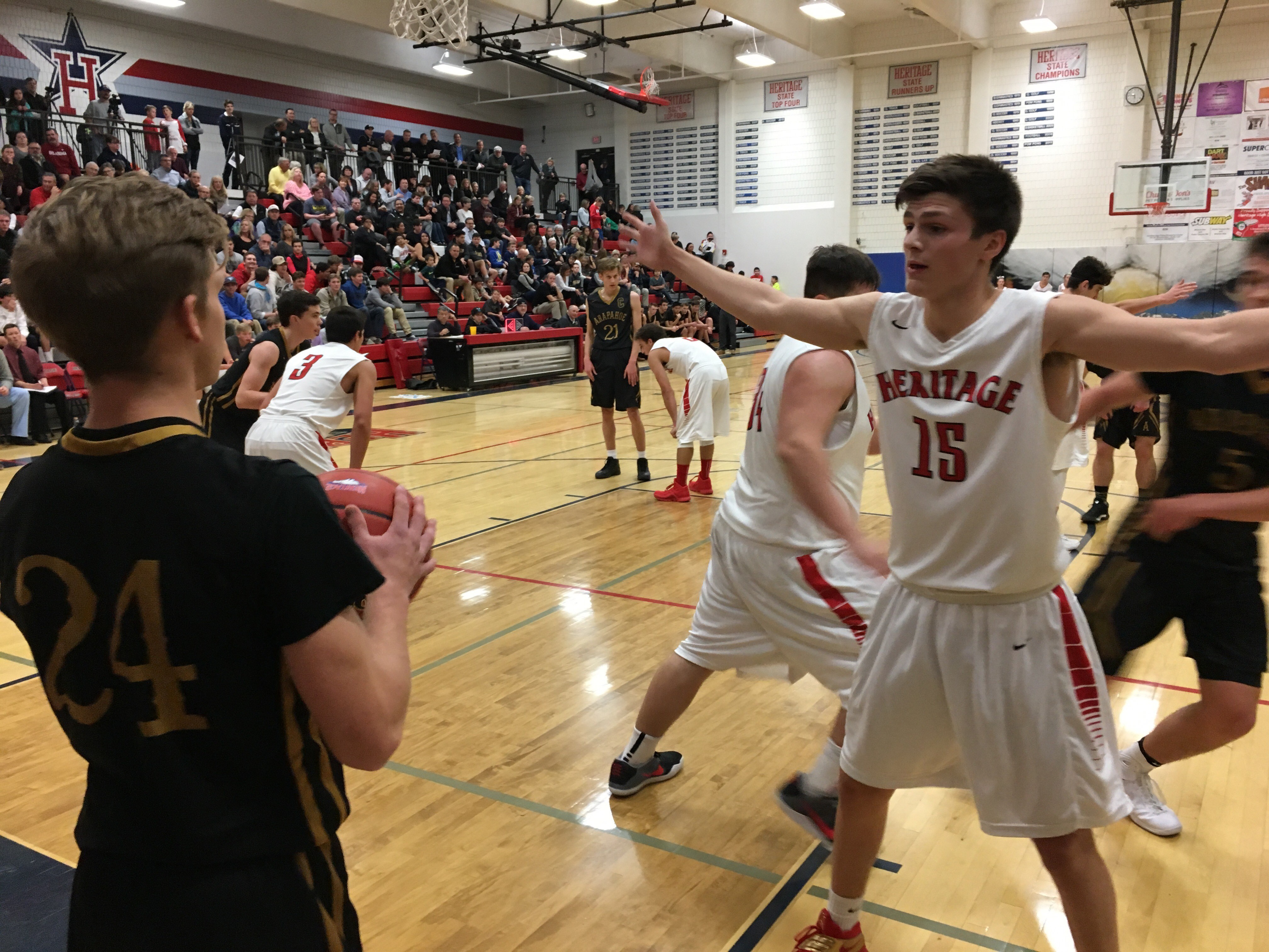 Arapahoe boys' basketball wins rivalry game over Heritage | 9news.com
