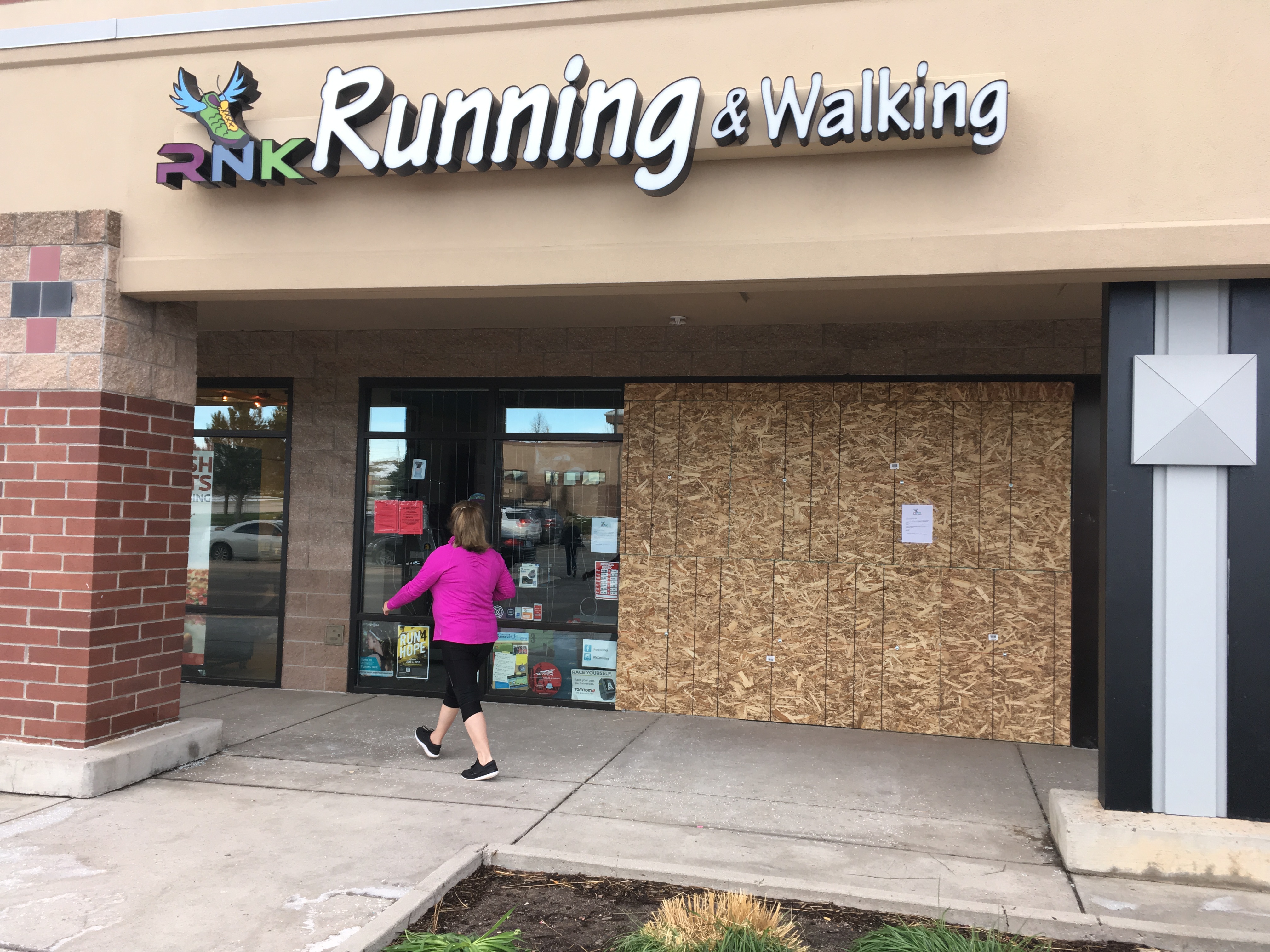 12-year-old remains critical after car careens through Parker store ...