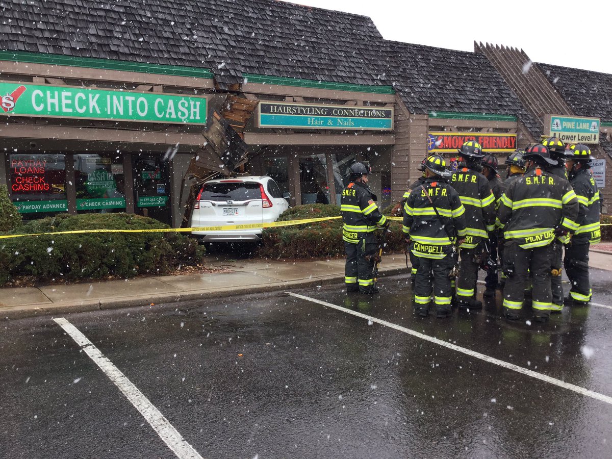Car crashes into Parker strip mall | 9news.com