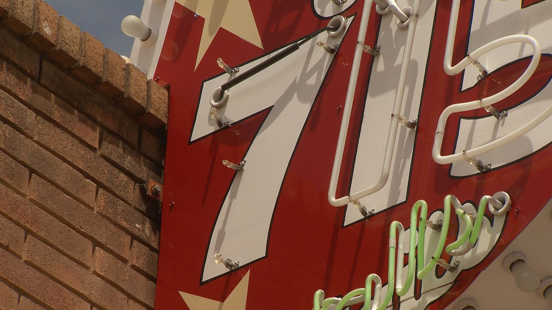 Last month's hail storm beat up some of Denver's iconic neon signs ...