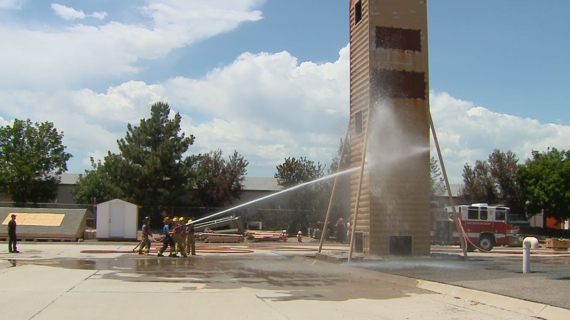 At this summer camp, girls learn how to be firefighters | 9news.com