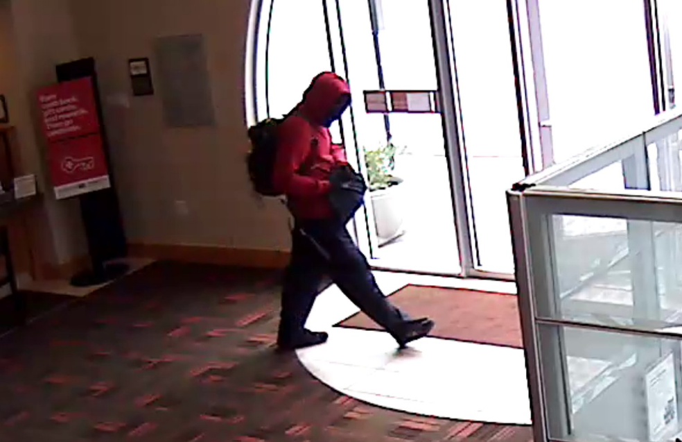 Man walks into Boulder bank, points gun at teller's head | 9news.com