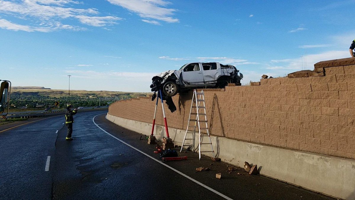 Car hanging over embankment in Golden after C470 rollover wreck | 9news.com