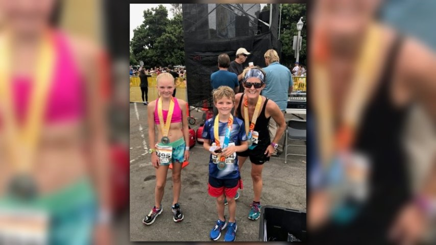 Aurora boy sets half marathon world record in San Diego | 9news.com