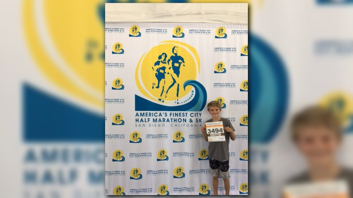 Aurora boy sets half marathon world record in San Diego | 9news.com
