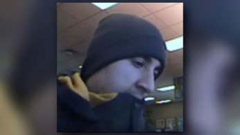 Police release up-close photos of bank robbery suspect | 9news.com